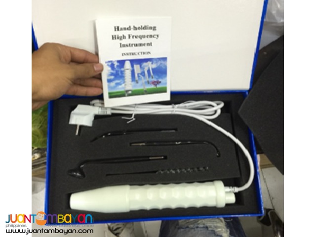 Hand Holding High Frequency Glass Instrument