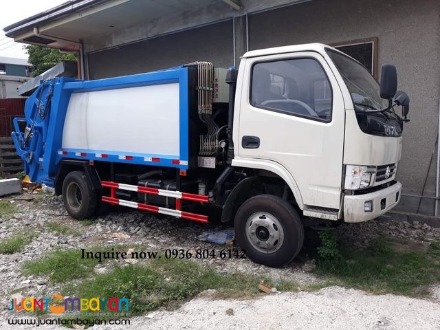 6 WHEELER GARBAGE COMPACTOR 5 CUBIC