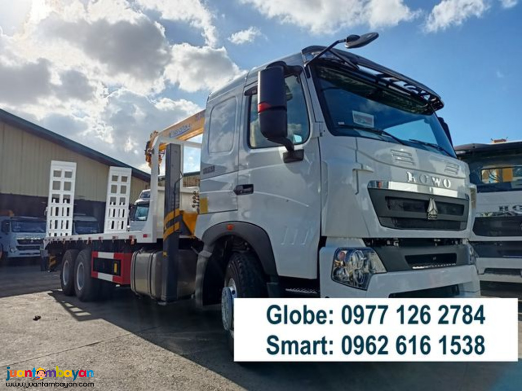 SELF-LOADING WITH 5TONS CRANE HOWO A7